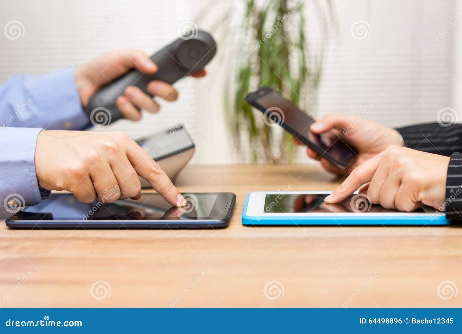 Business People Using Tablet Computers during Meeting and Using Stock ...