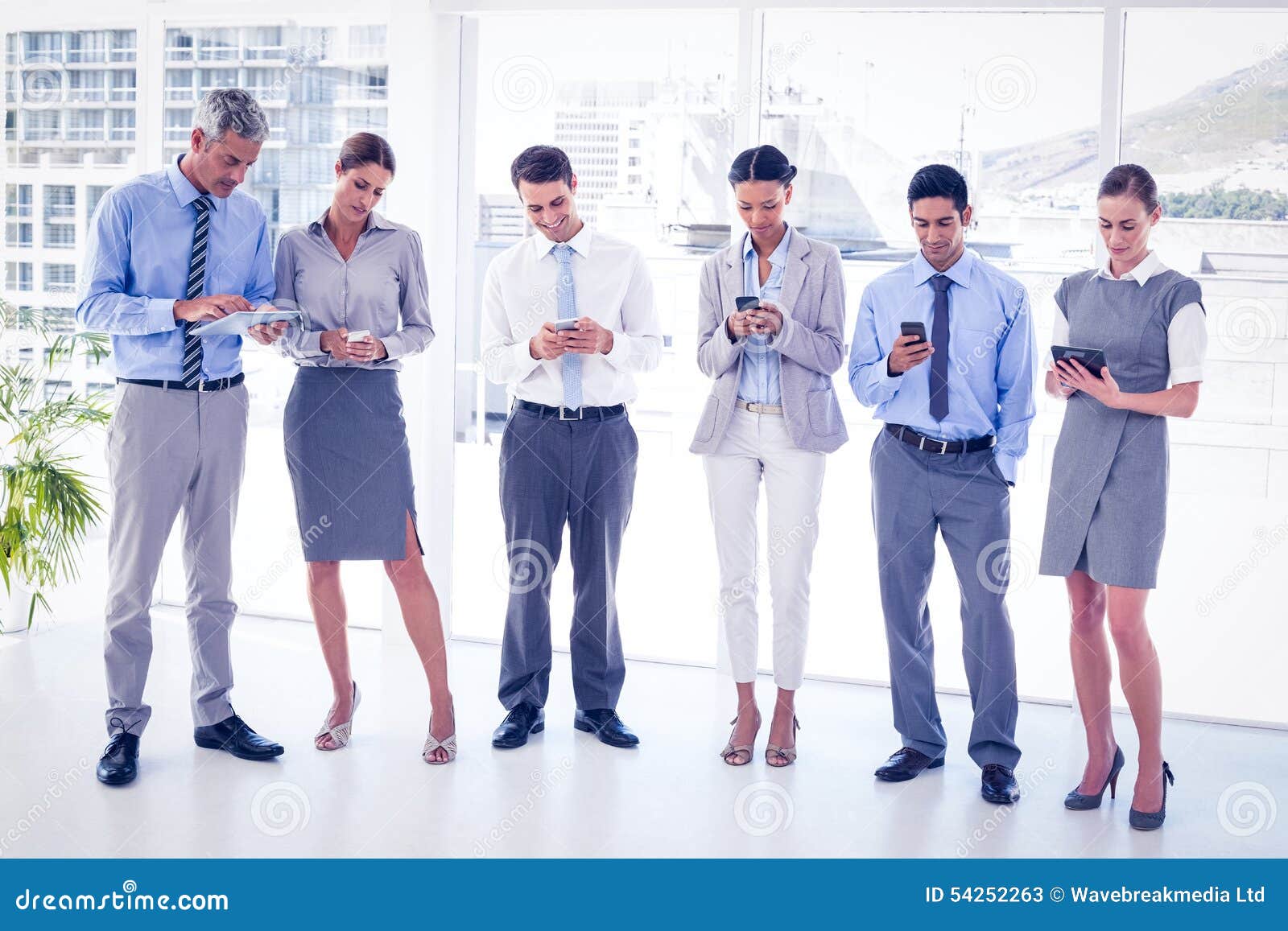 Business People Using Their Phone Stock Image - Image of businesswoman ...