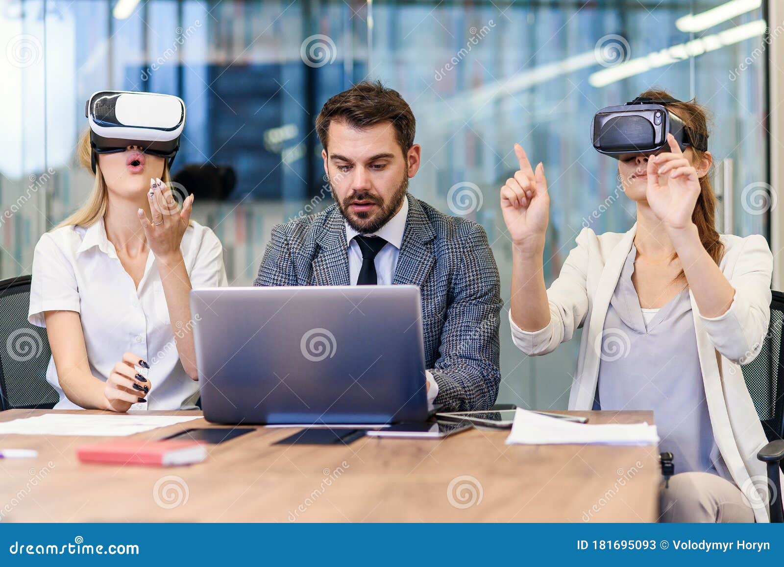 Business People Using Virtual Reality Goggles during Meeting. Team of ...