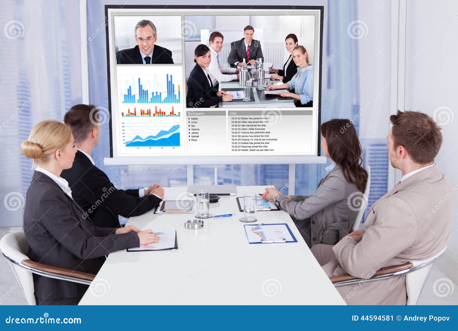 Business People in Video Conference at Table Stock Image - Image of ...