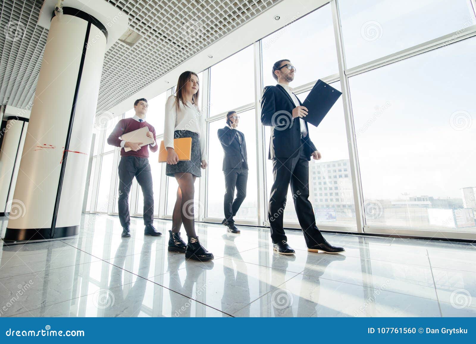 Business People Walking in the Office Corridor. Walk Team. Stock Photo ...