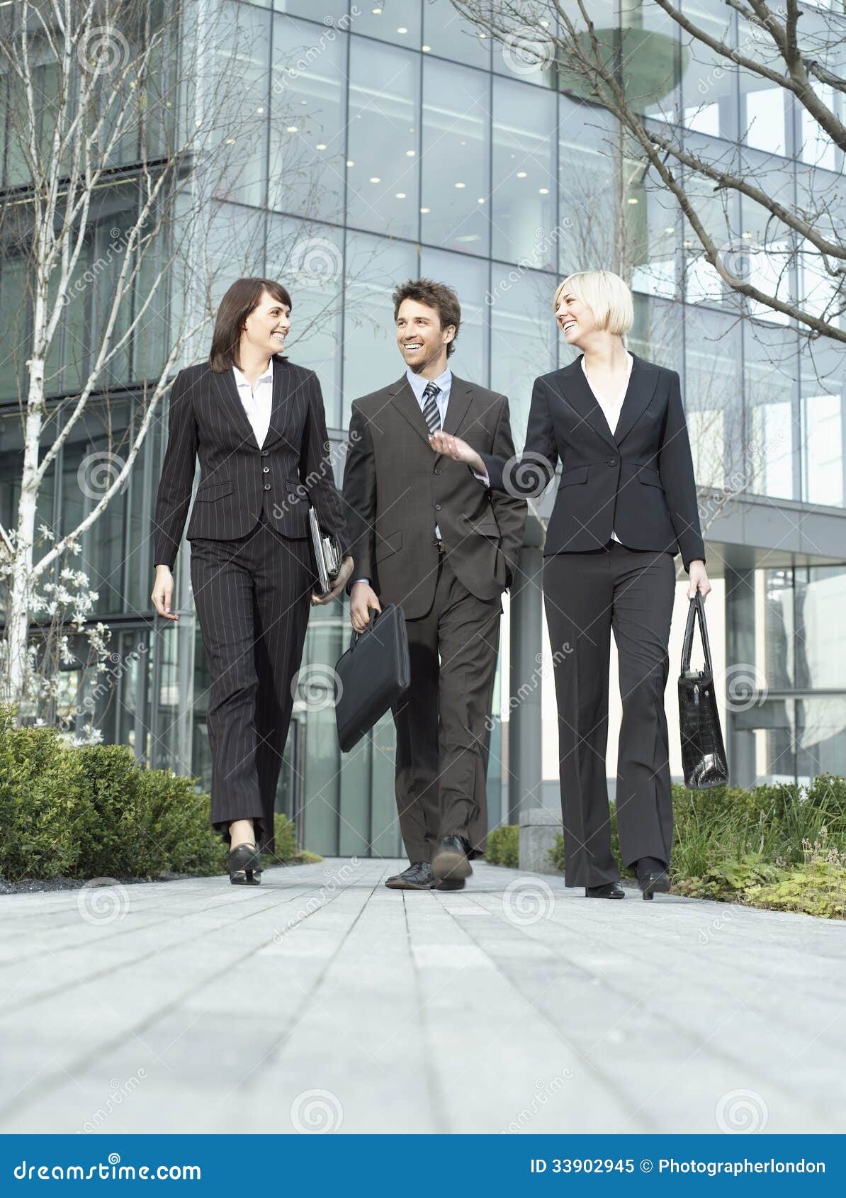 Business People Walking Outside Office Building Stock Image - Image of ...