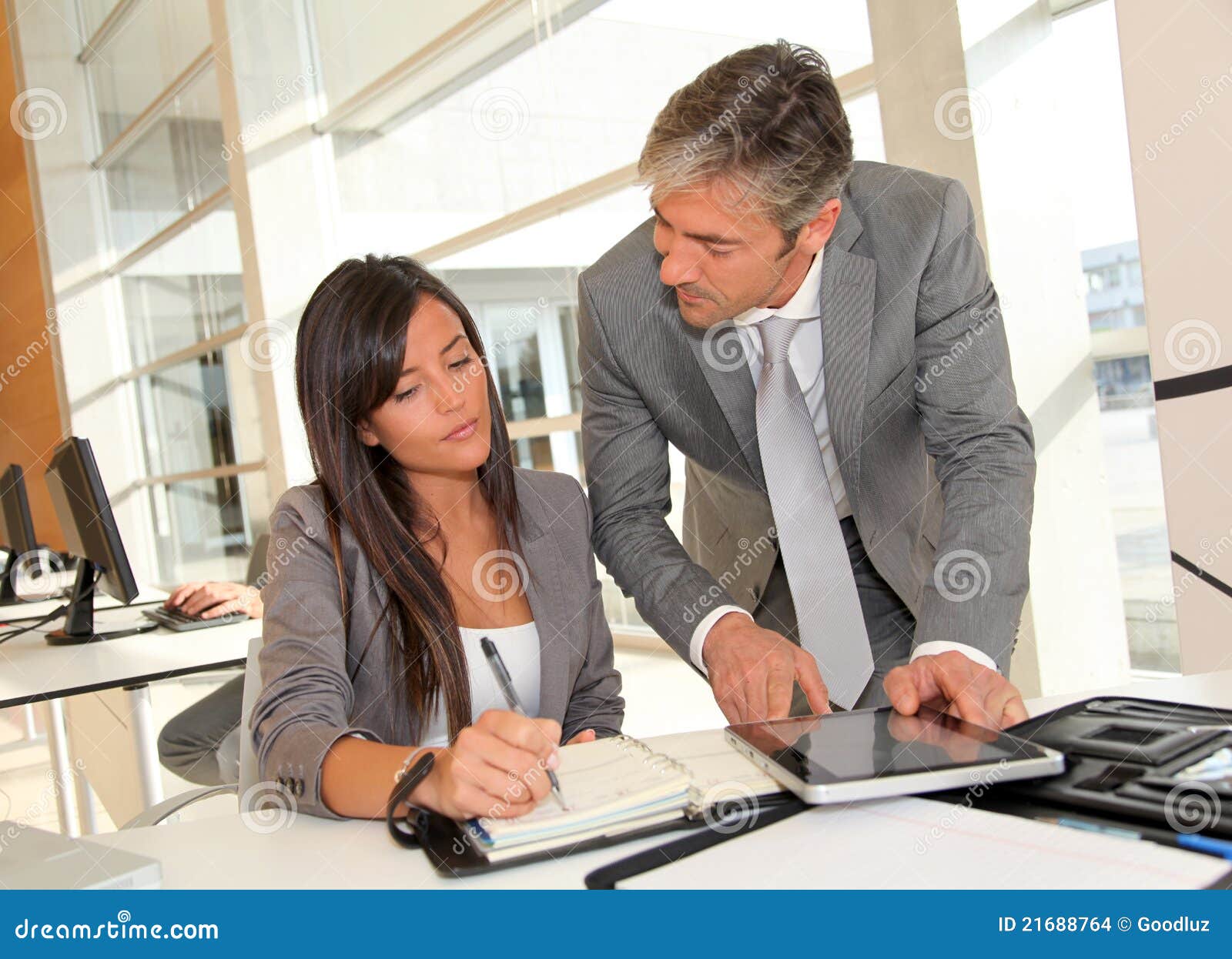 Business people at work stock photo. Image of noting - 21688764