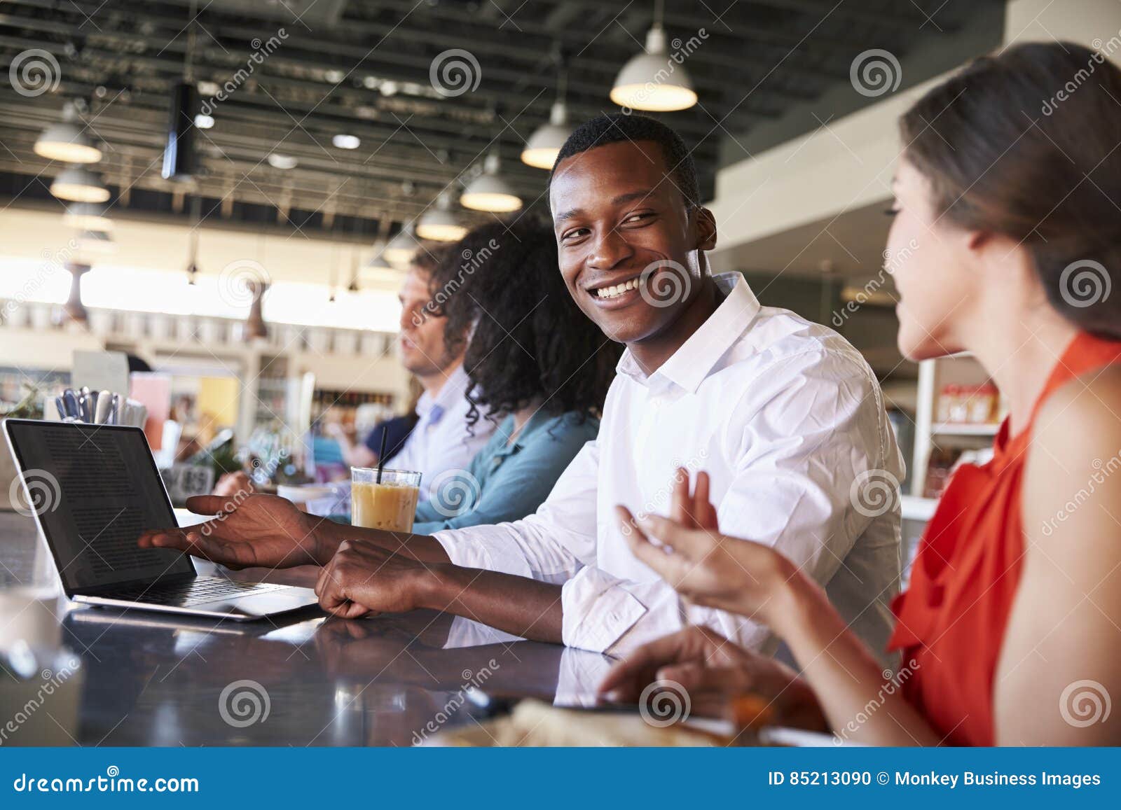 Business People Working at Counter in Coffee Shop Stock Photo - Image ...
