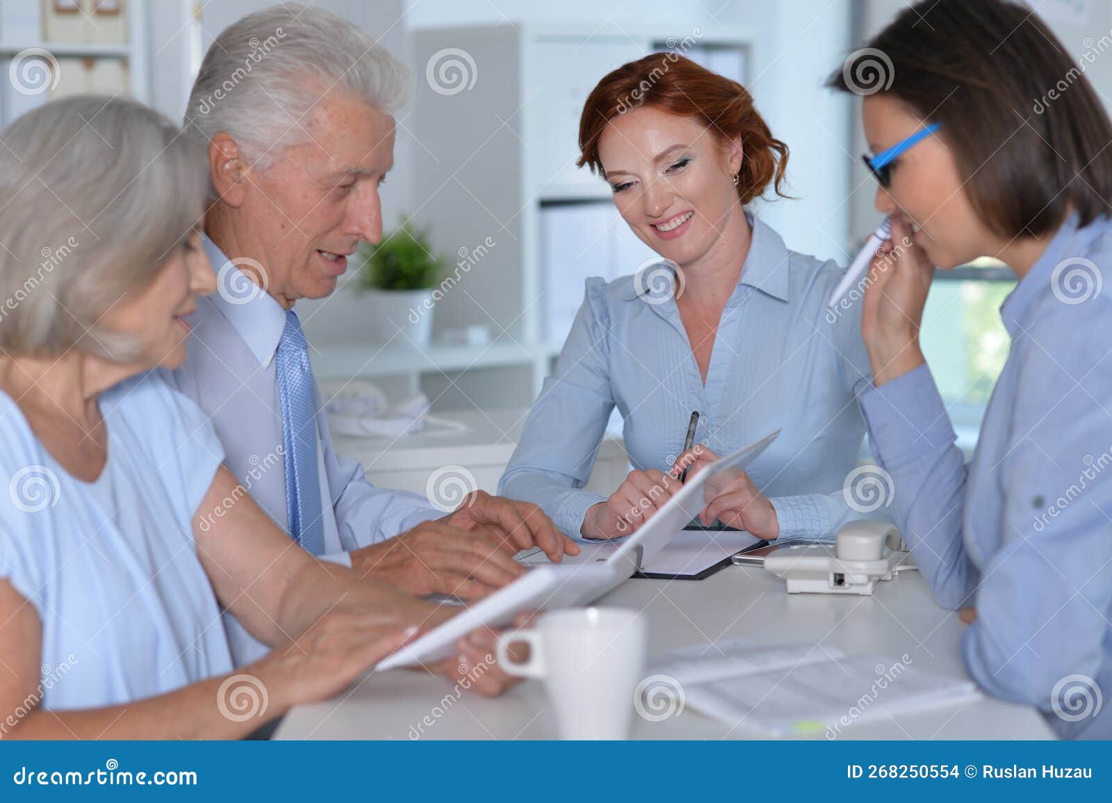 Business People Working at Desk in Office Stock Photo - Image of people ...