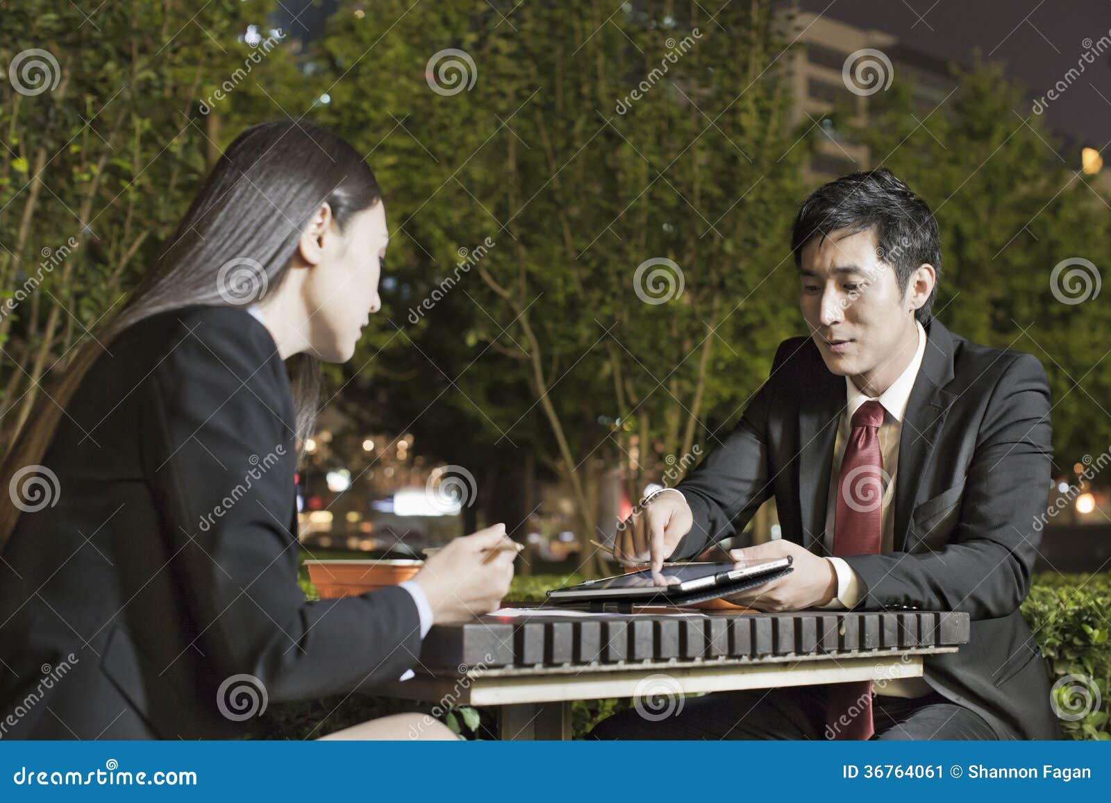Business People Working while Having Dinner Stock Image - Image of ...