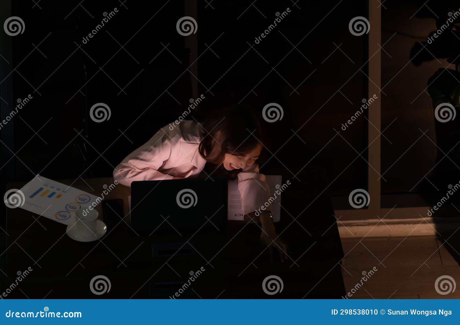 Business People Working with Laptop Computer in Dark Office Stock Photo ...