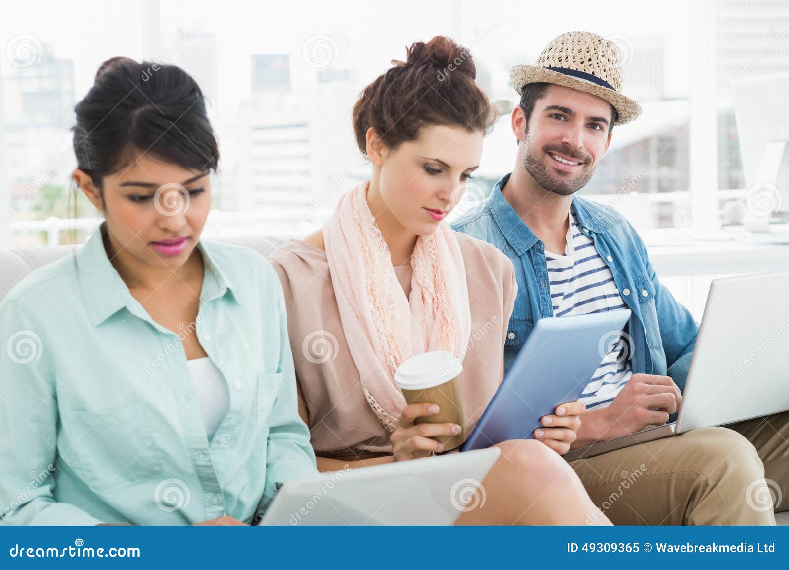 Business People Working with Laptop and Tablet on Couch Stock Image ...