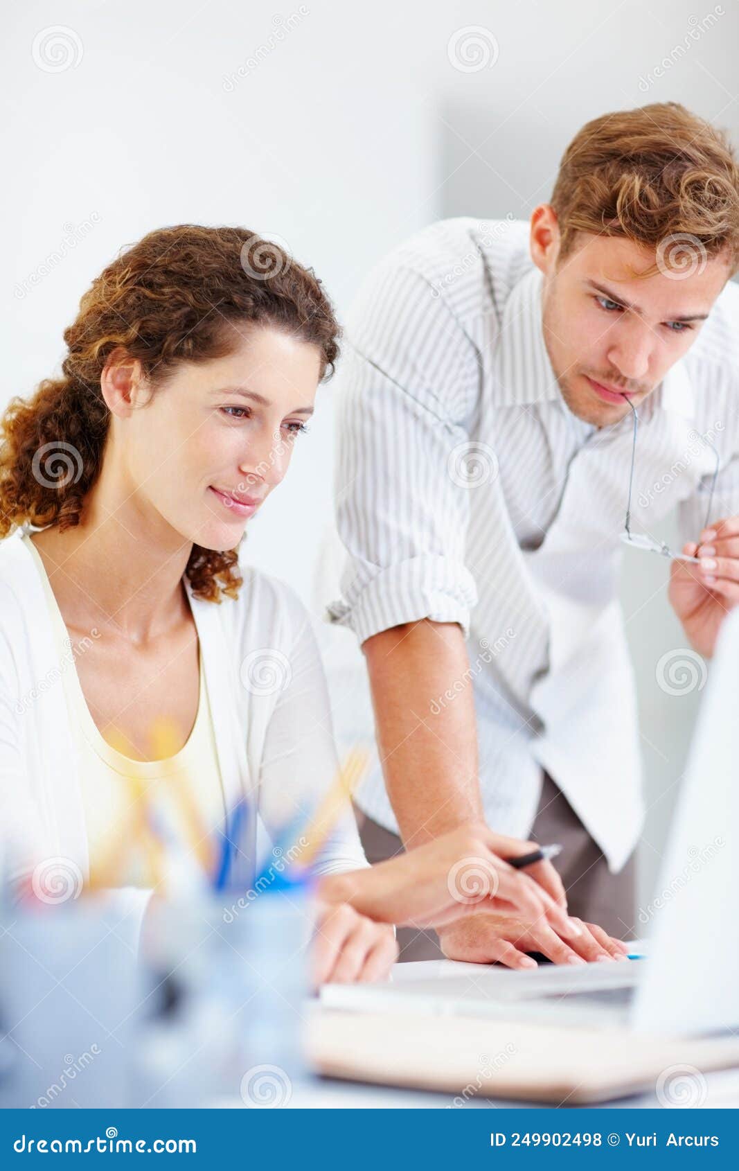 Business People Working on Laptop. Two Casually Dressed Business People ...