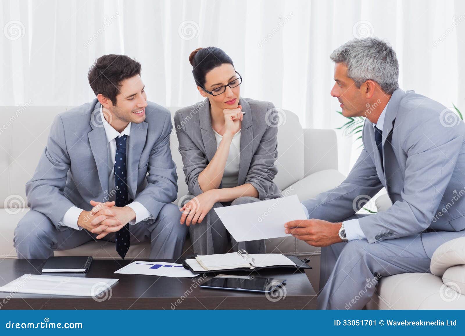 Business People Working and Talking Together on Sofa Stock Image ...