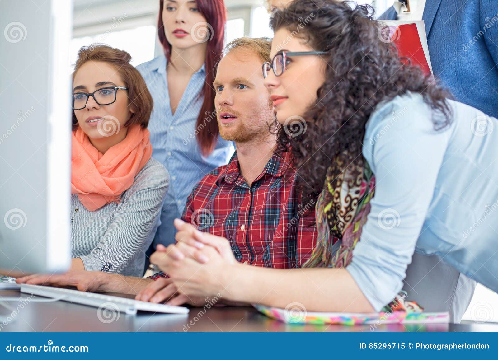 Business People Working Together on Computer in Office Stock Image ...
