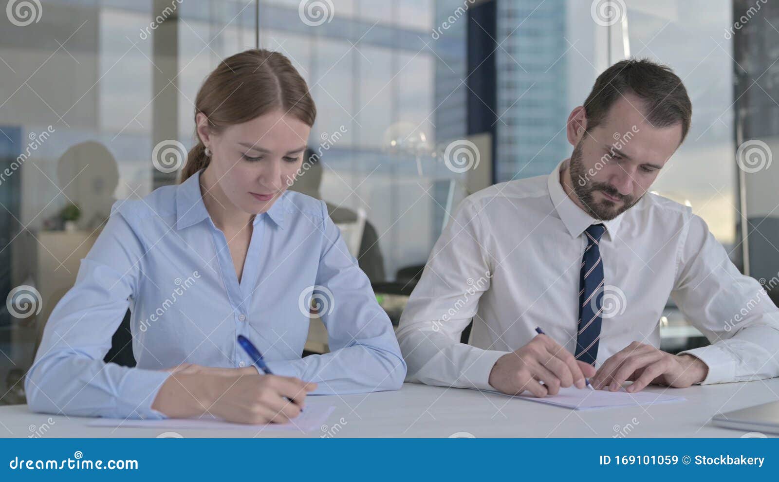 The Business People Writing Documents on Office Table Stock Image ...