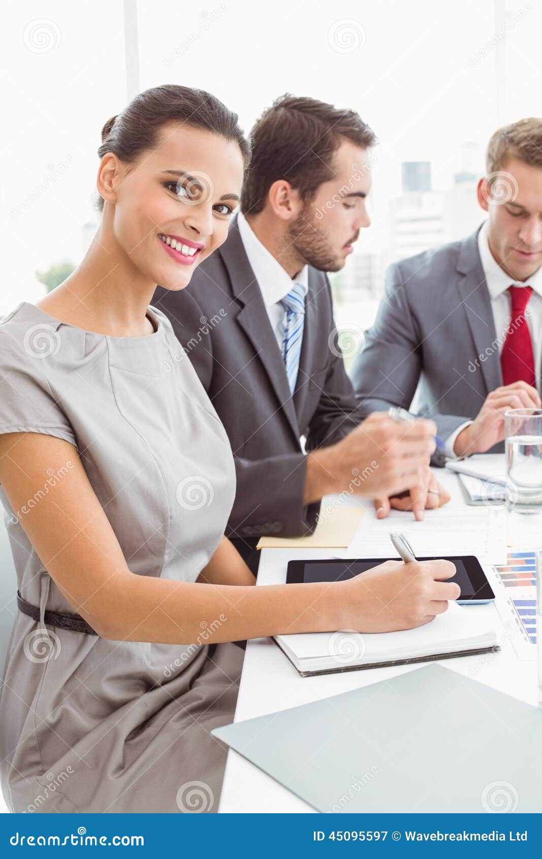 Business People Writing Notes in Board Room Meeting Stock Image - Image ...