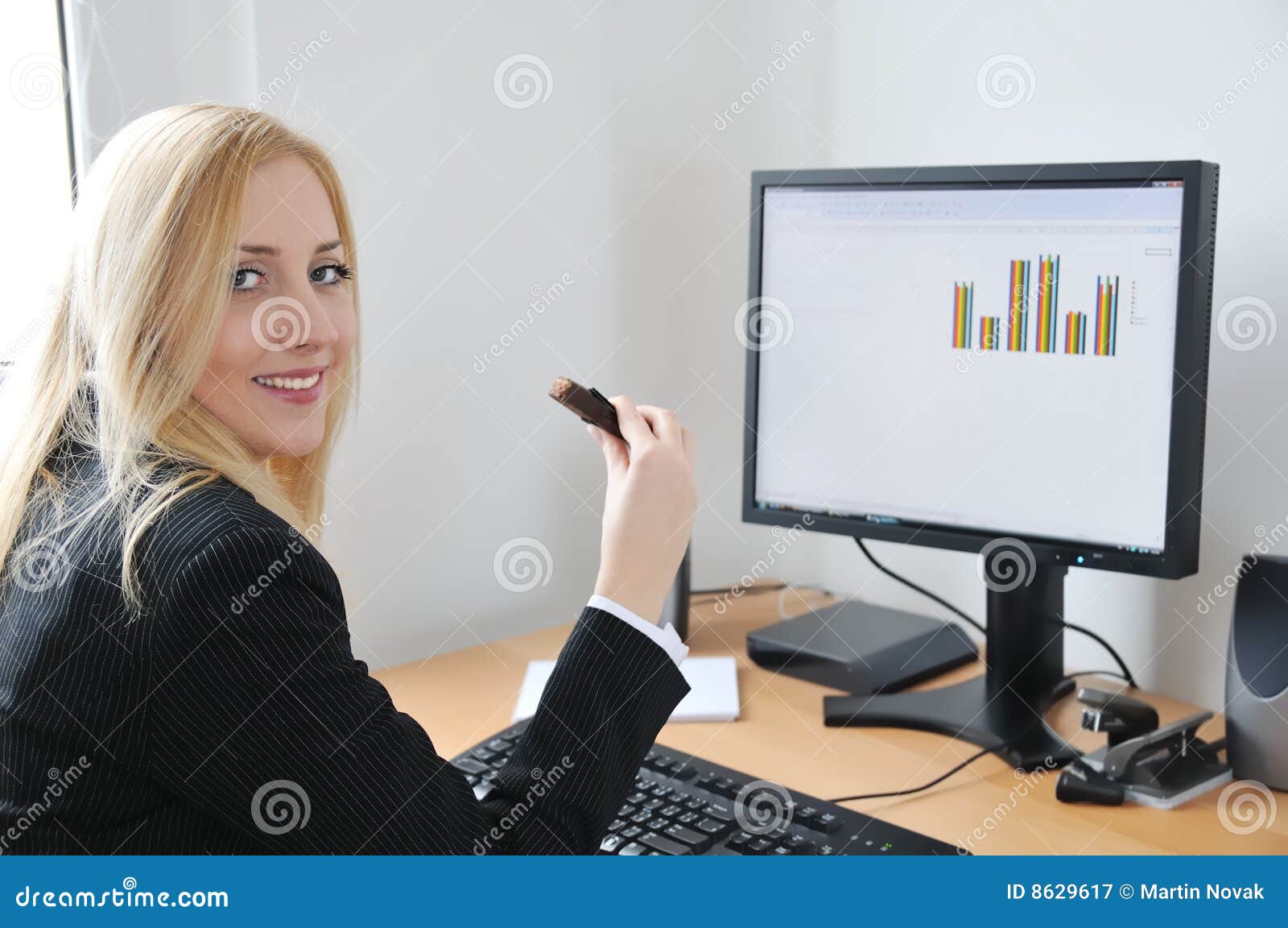 Business Person Eating Chocolate at Work Stock Image - Image of ...