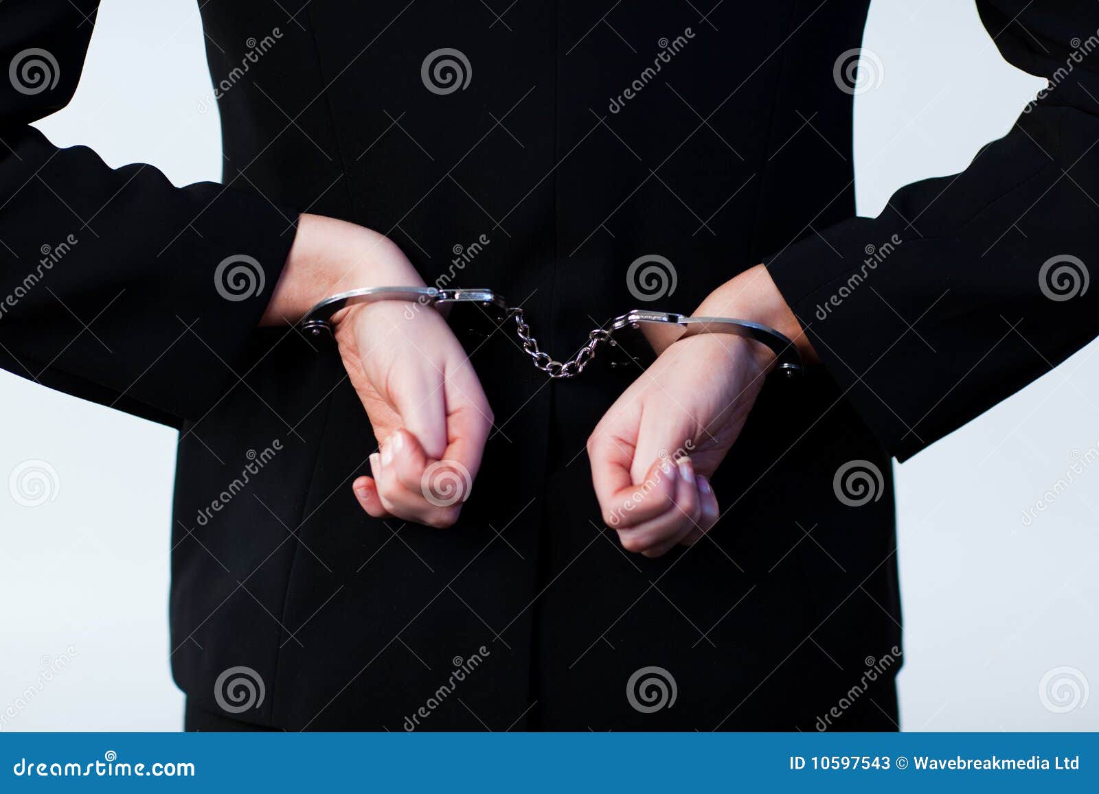 Business person handcuffed stock image. Image of hand - 10597543