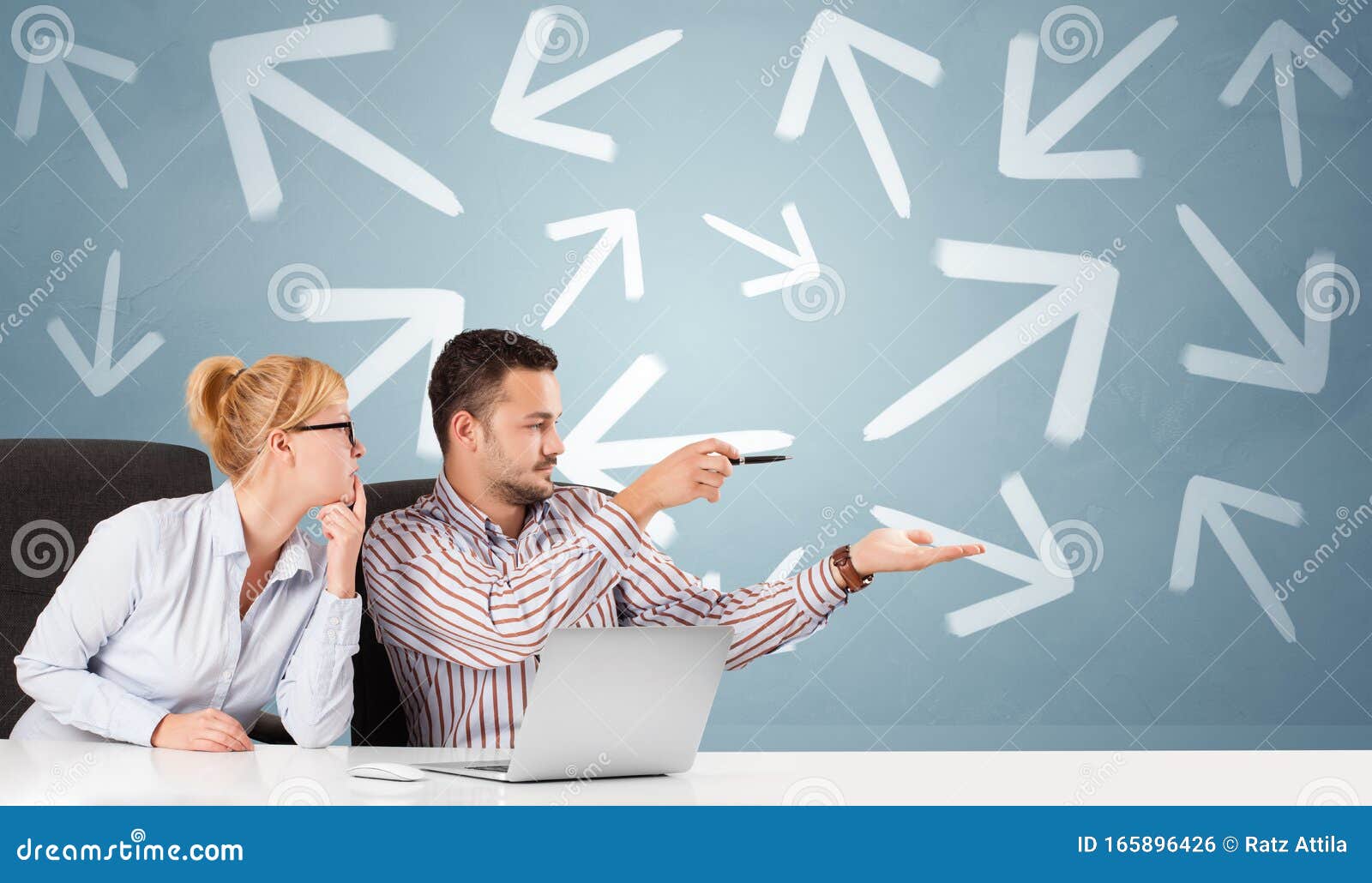 Business Person Sitting at Desk with Direction Concept Stock Photo ...