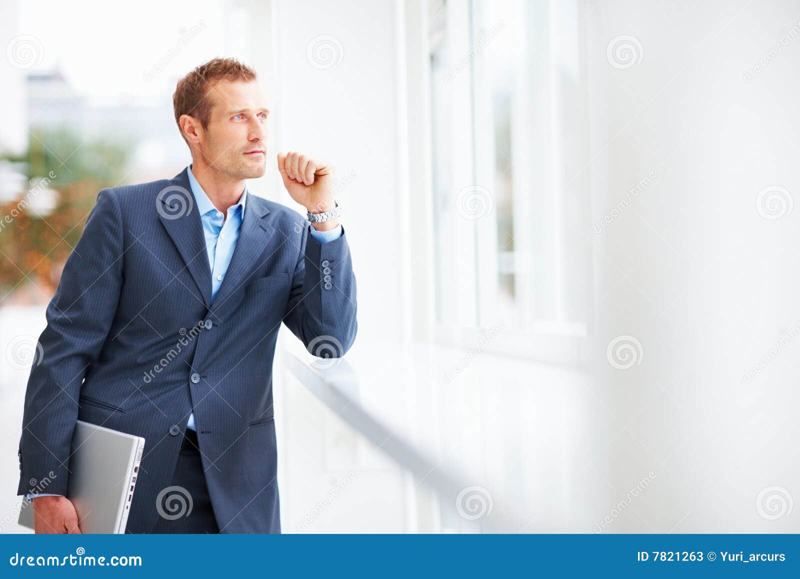 Business Person Standing with a Laptop in Hand Stock Image - Image of ...