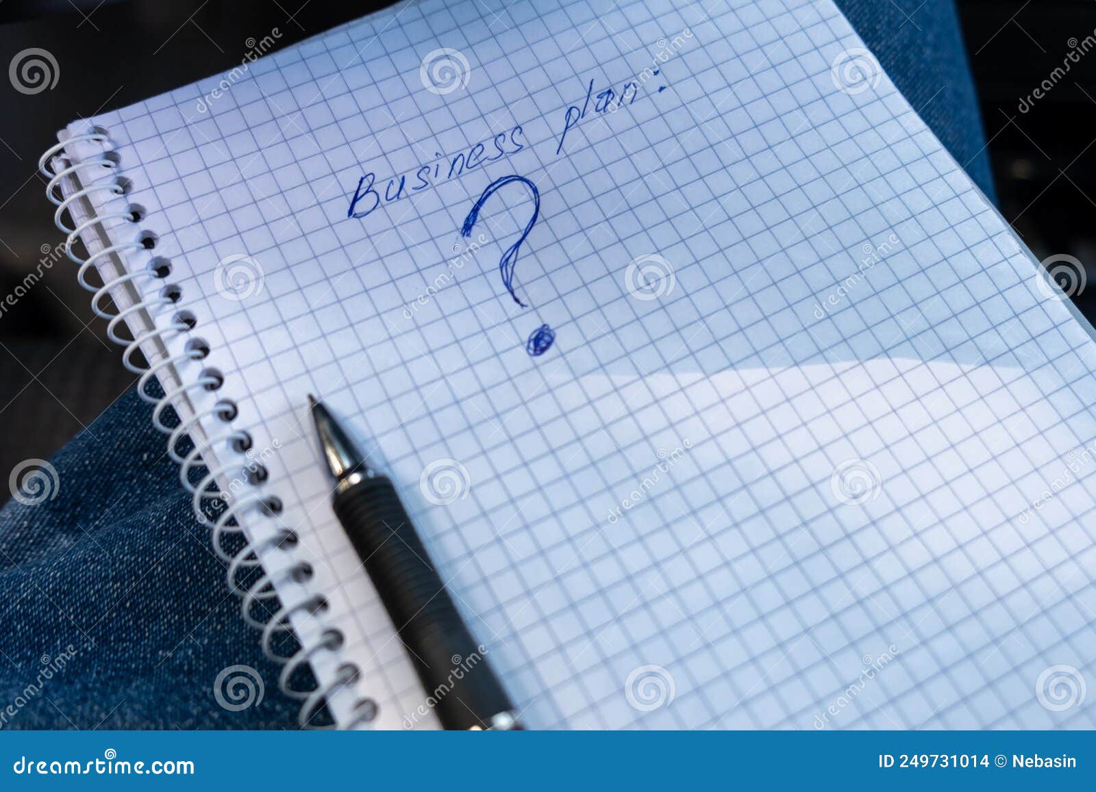 Business Plan and Question Mark Written on a Notebook. Reflections on ...