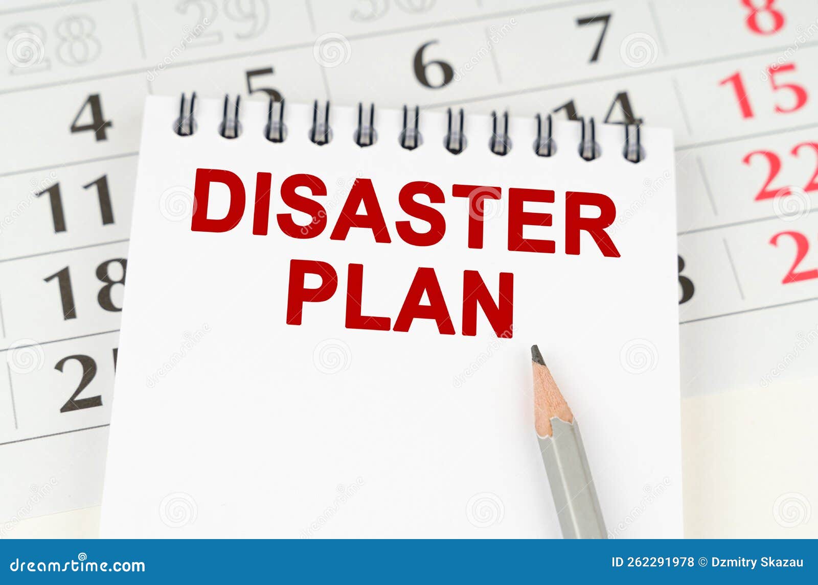 On the Calendar is a Notebook with the Inscription - DISASTER PLAN ...