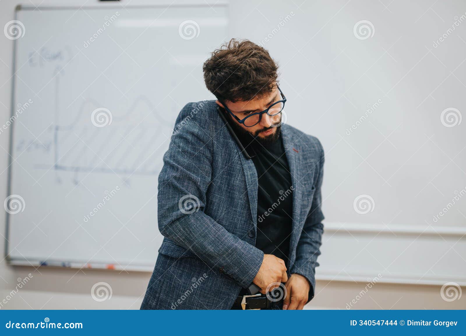 Business Professional Multitasking during a Meeting in the Office Stock ...