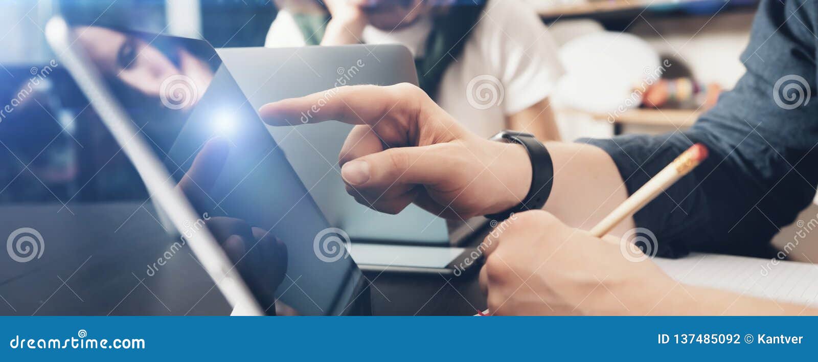 Business Professionals Using Computer while Spending Time in the Office ...