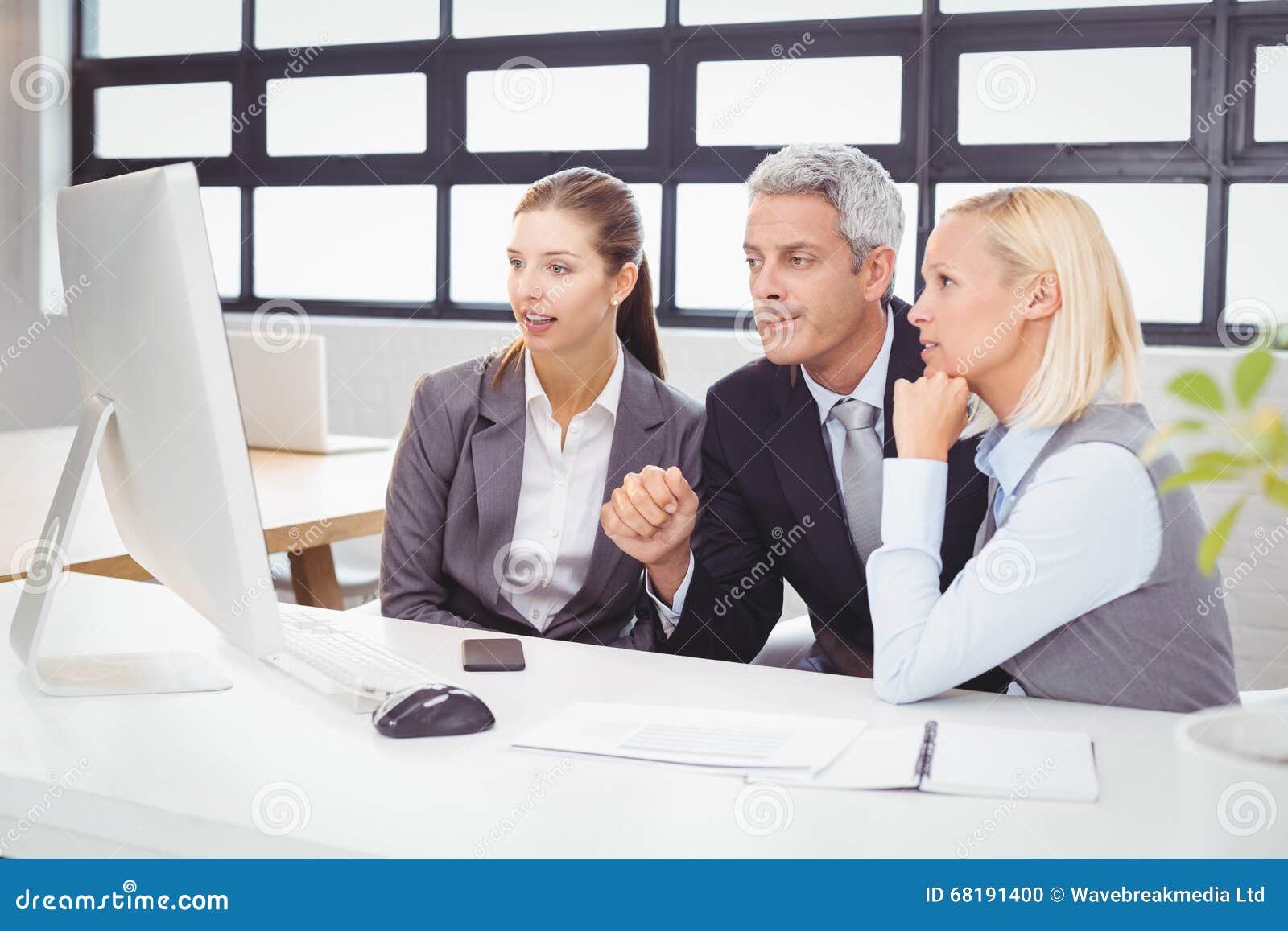 Business Professionals Working at Computer Desk Stock Photo - Image of ...