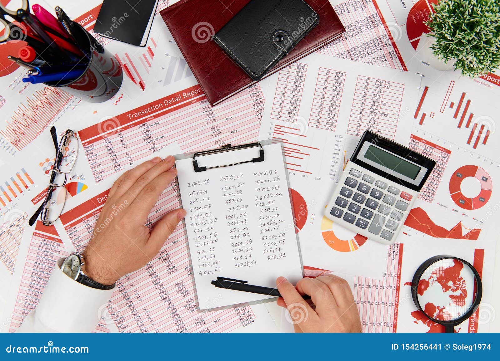 Business Reports, Data Tables and Charts - Directly Above View of ...