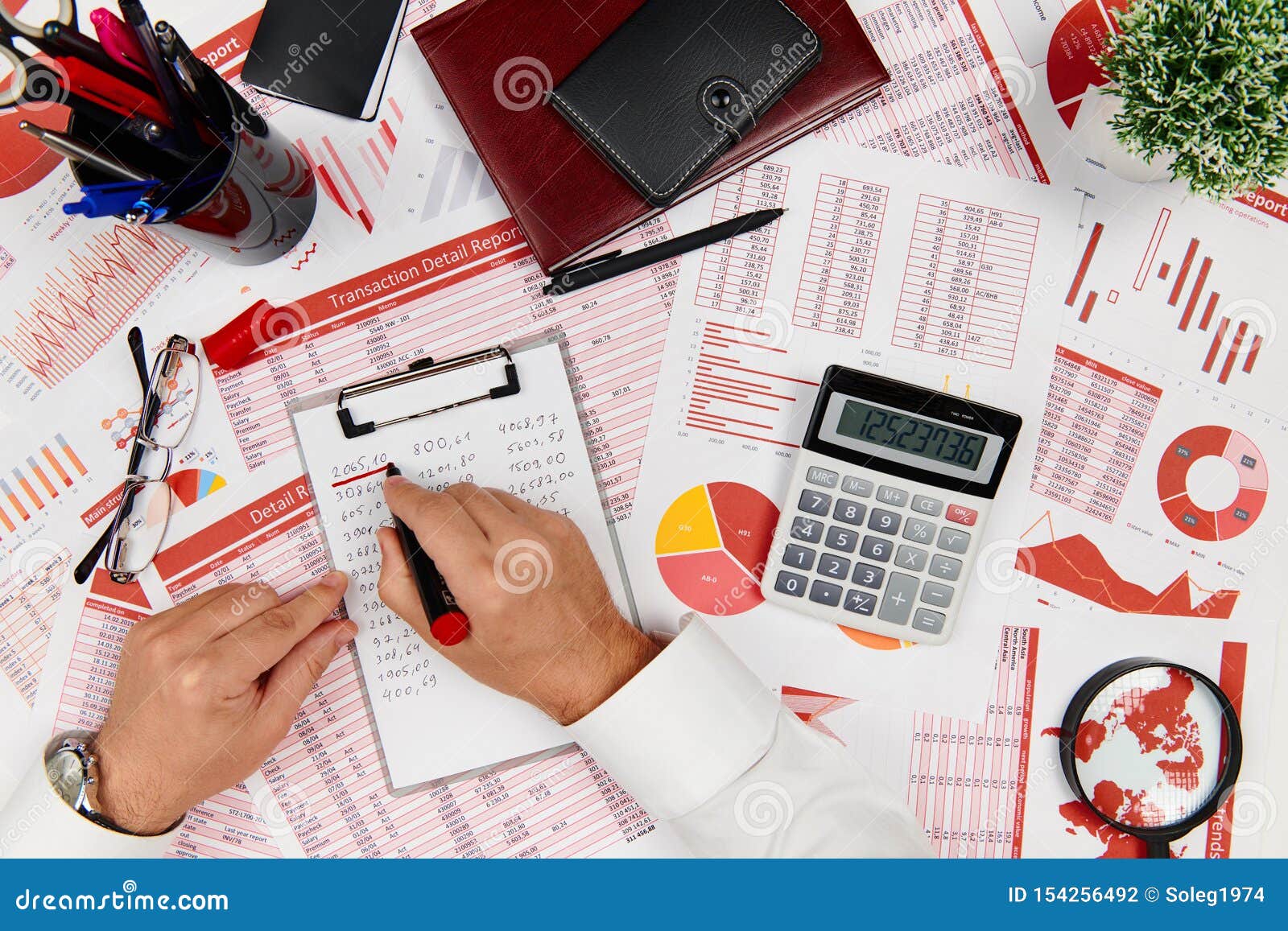 Business Reports, Data Tables and Charts - Directly Above View of ...