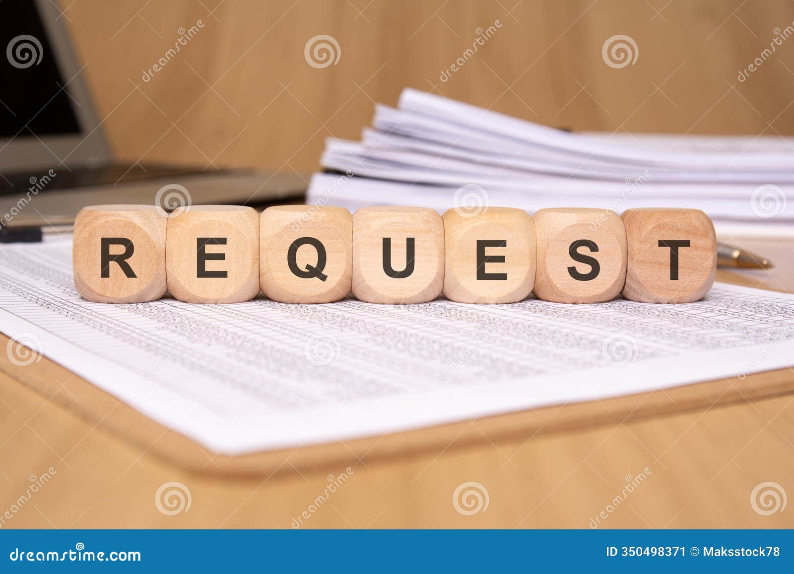 Business Request Concept with Various Wooden Blocks Arranged on Important Document Surface Stock ...