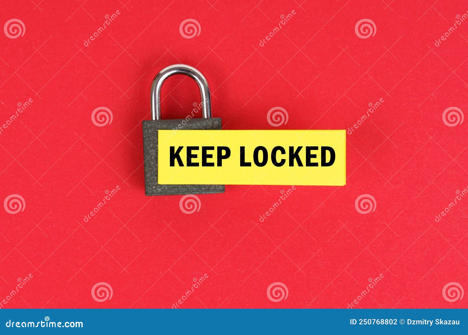 On the Red Surface There is a Lock with a Sticker with the Inscription ...