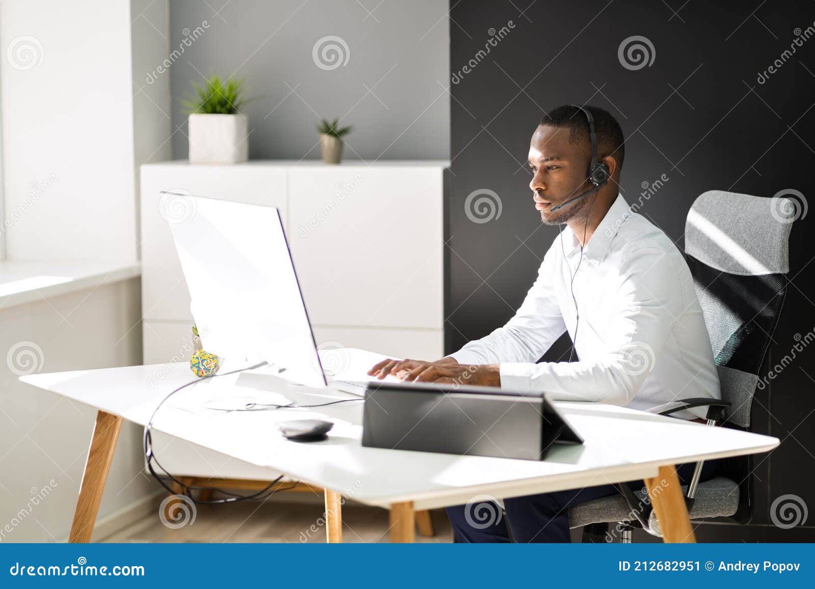 Business Service Agent with Headset at Computer Stock Image - Image of ...