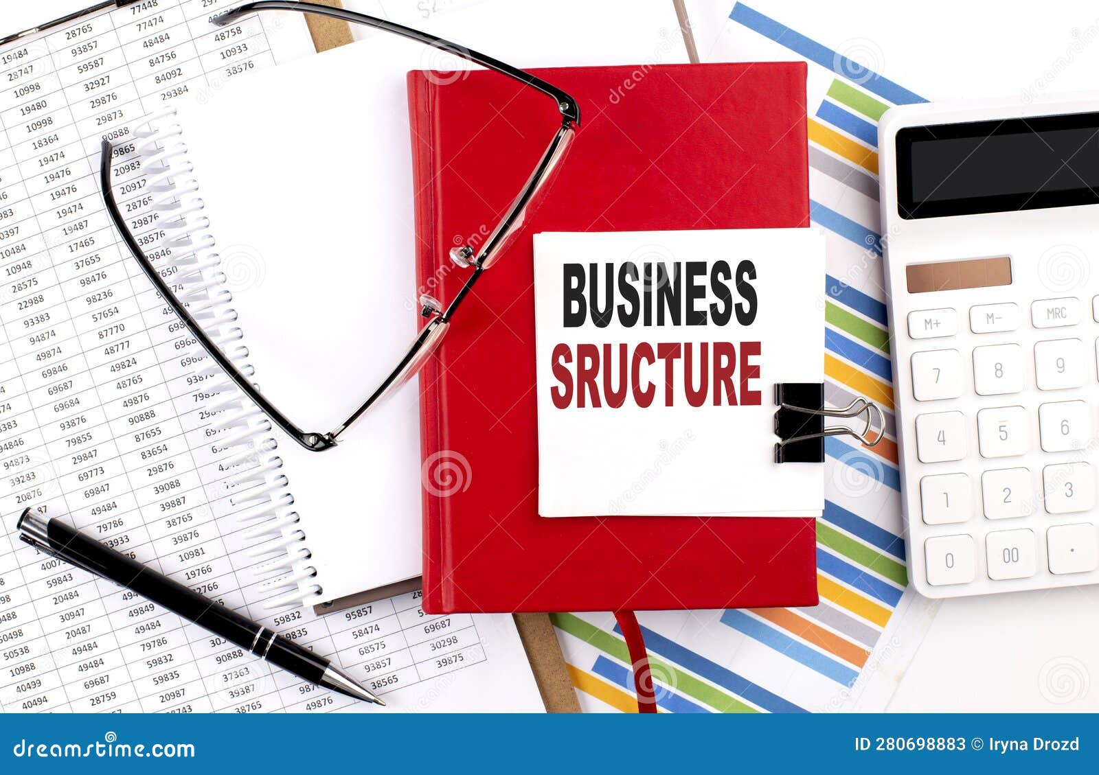 BUSINESS STRUCTURE Text on Notebook with Chart, Calculator and Pen ...