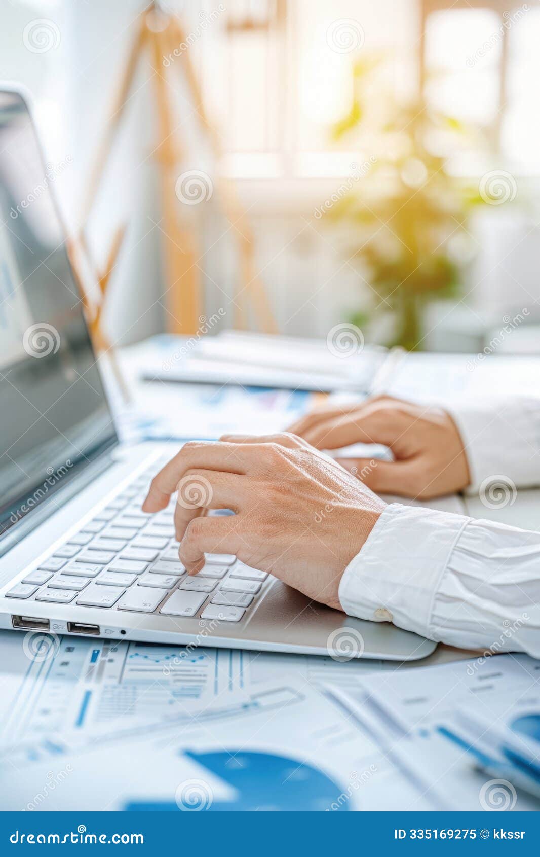 Business Success Concept, Two Hands Typing Efficiently on a Backlit ...