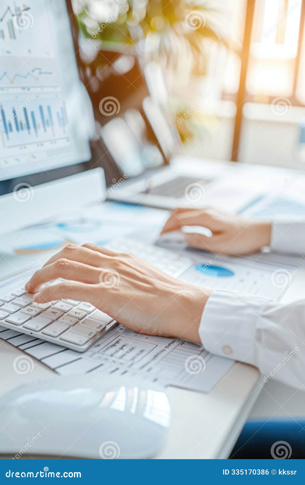 Business Success Concept, Two Hands Typing Efficiently on a Backlit ...