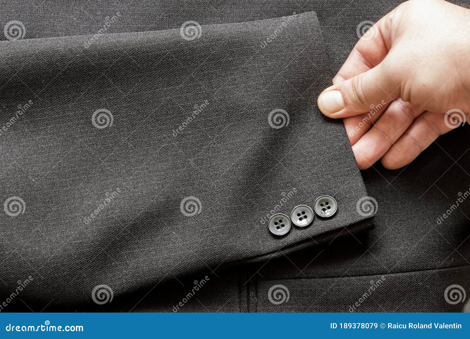 Hand Grabbing Business Suit Sleeve Stock Image - Image of fashion, blue ...