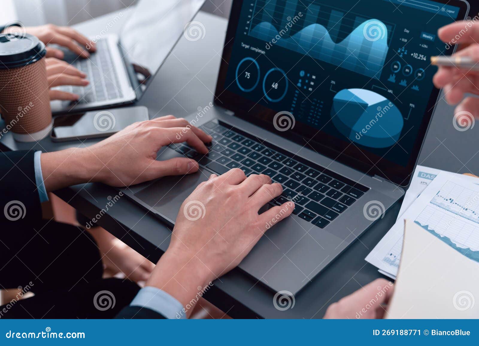 Closeup To View Hand Using Laptop To Analyze Financial Data in Harmony ...