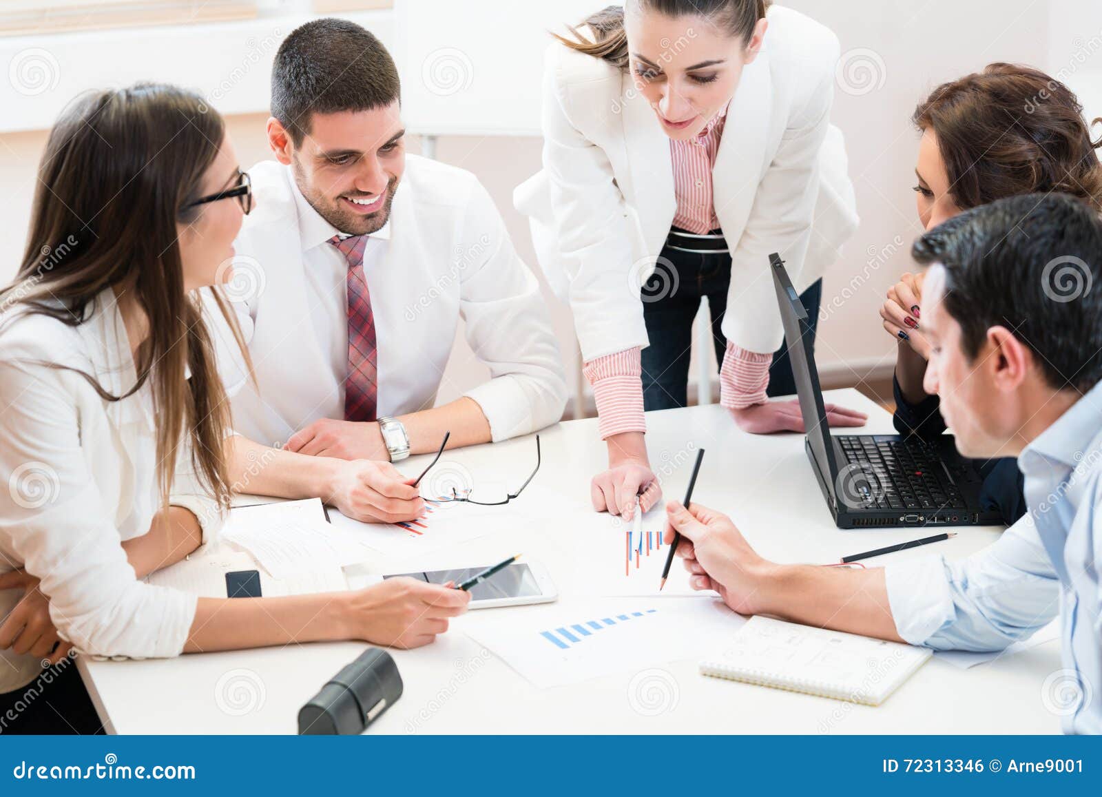 Business Team Analyzing Data and Discussing Strategy Stock Photo ... Business Team Analyzing Data and Discussing Strategy Stock Photo ...