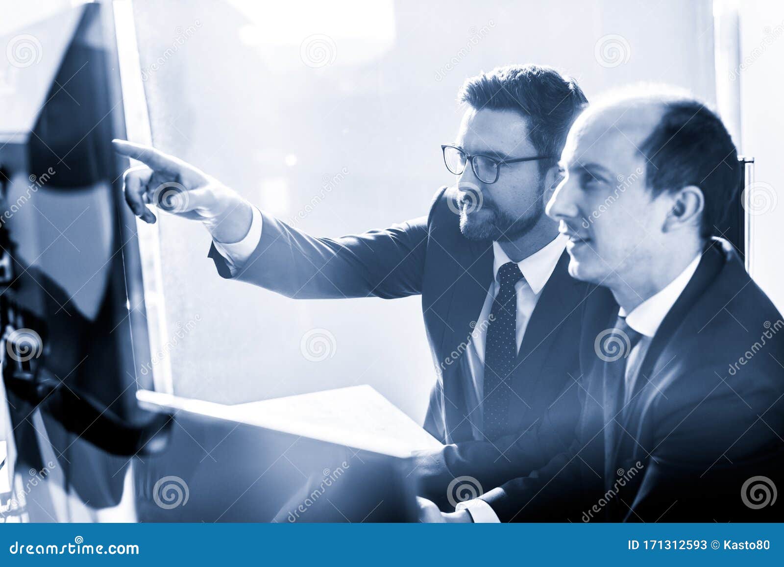 Business Team Analyzing Data at Business Meeting in Modern Corporate ...