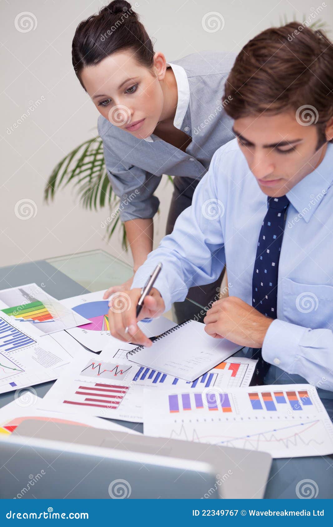 Business Team Analyzing Statistics Together Stock Image - Image of ...
