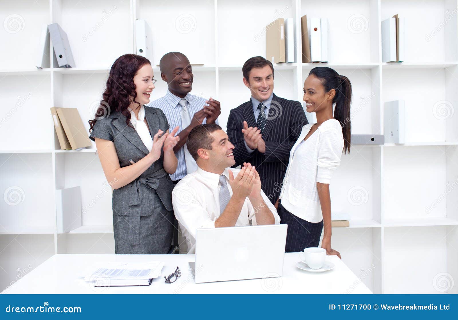 Business Team Applauding a Collegue Stock Photo - Image of happy ...
