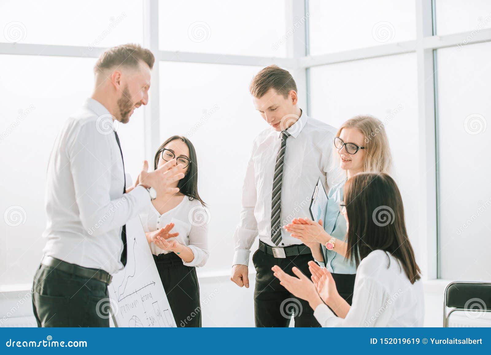 Business Team Applauding after a Successful Business Presentation ... Business Team Applauding after a Successful Business Presentation ...