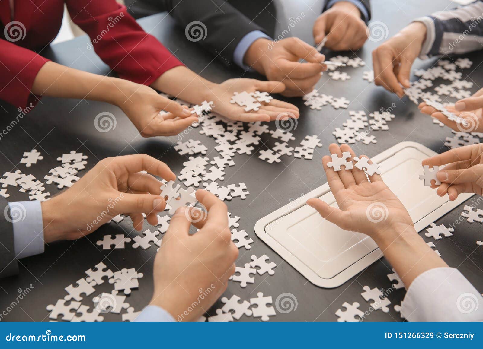 Business Team Assembling Puzzle on Dark Table Stock Image - Image of ...