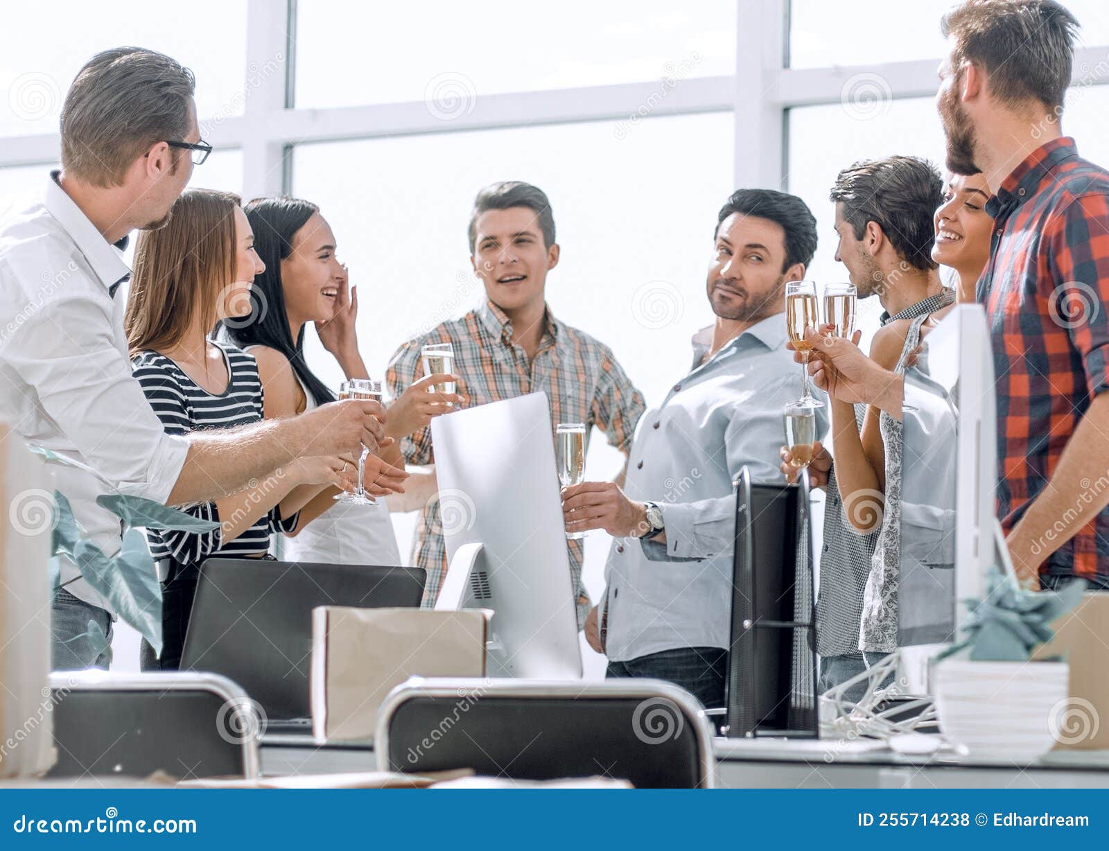 Business Team Celebrates the Move while Standing in the Office Stock ...