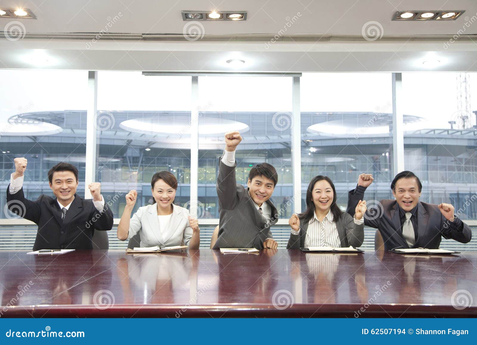 Business Team Cheering stock photo. Image of indoors - 62507194
