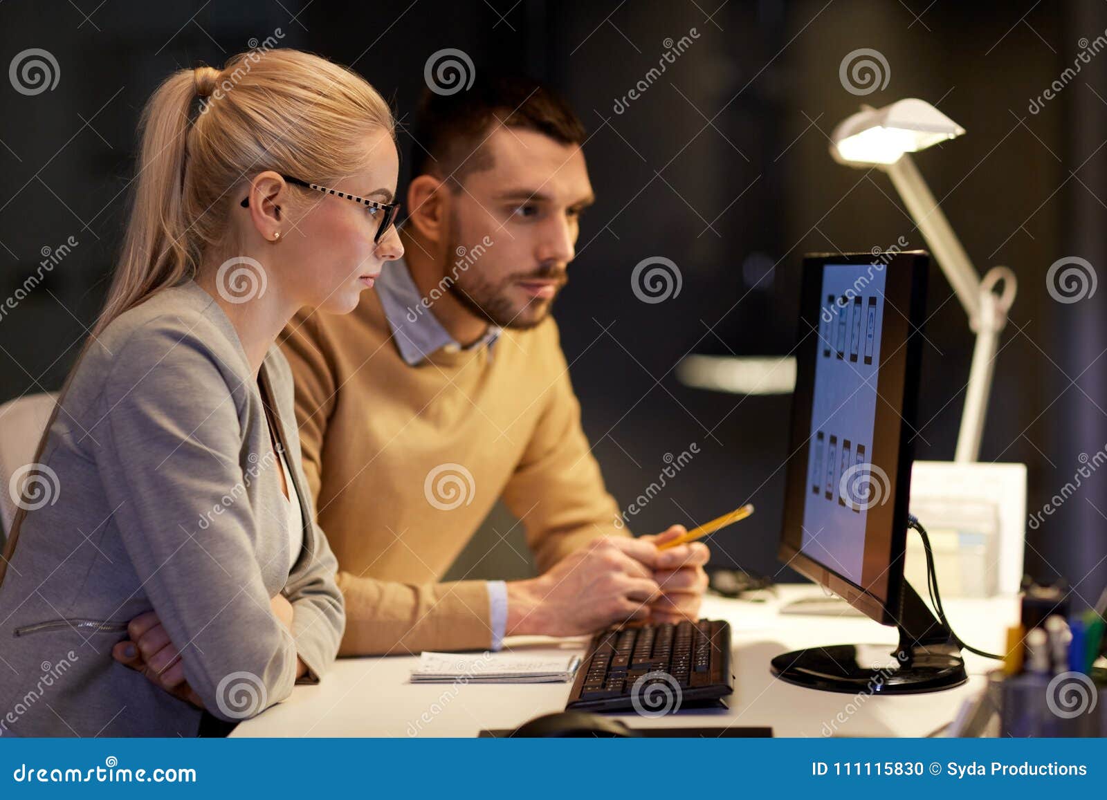 Business Team with Computer Working Late at Office Stock Photo - Image ...