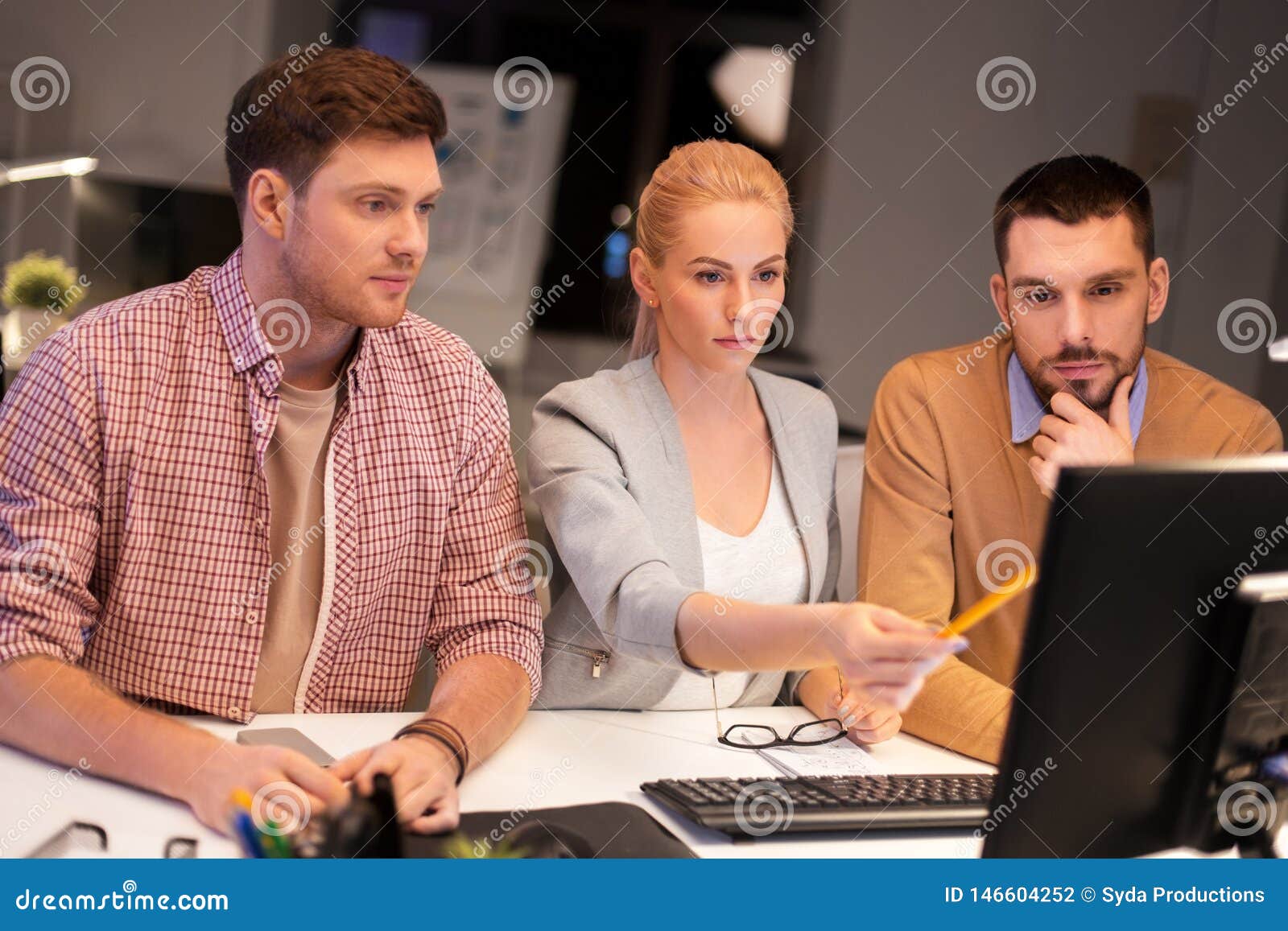 Business Team with Computer Working Late at Office Stock Photo - Image ...