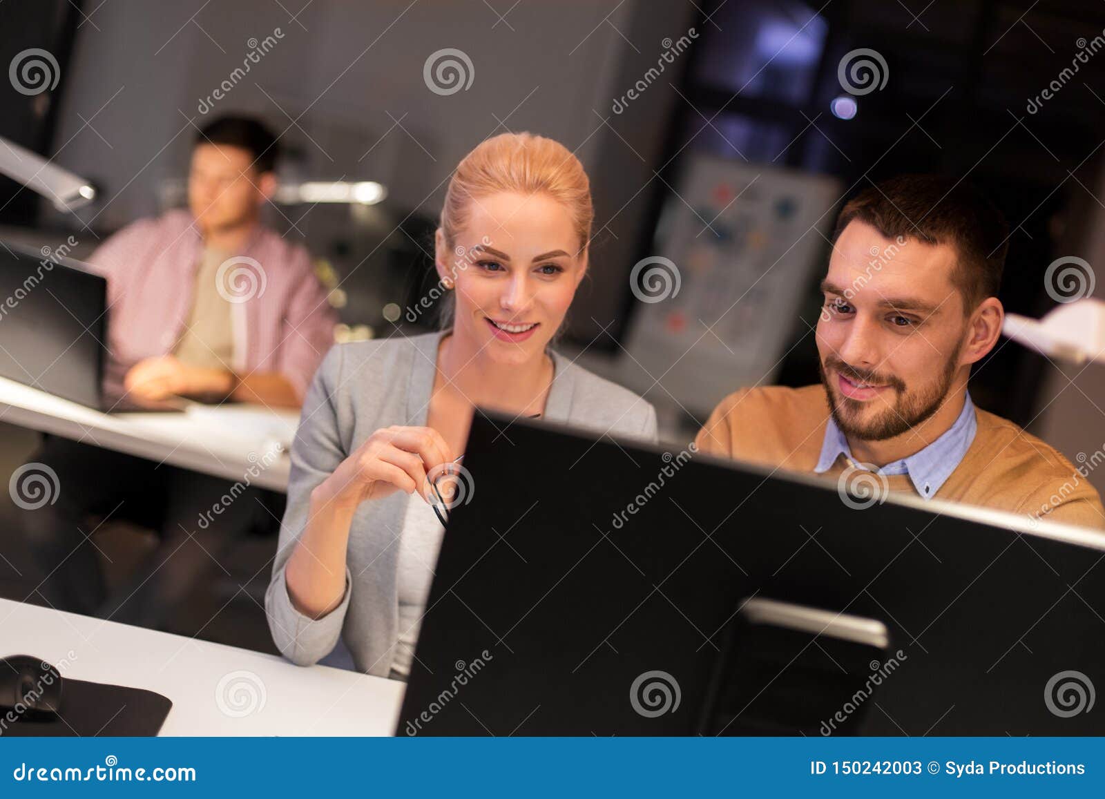 Business Team with Computer Working Late at Office Stock Image - Image ...