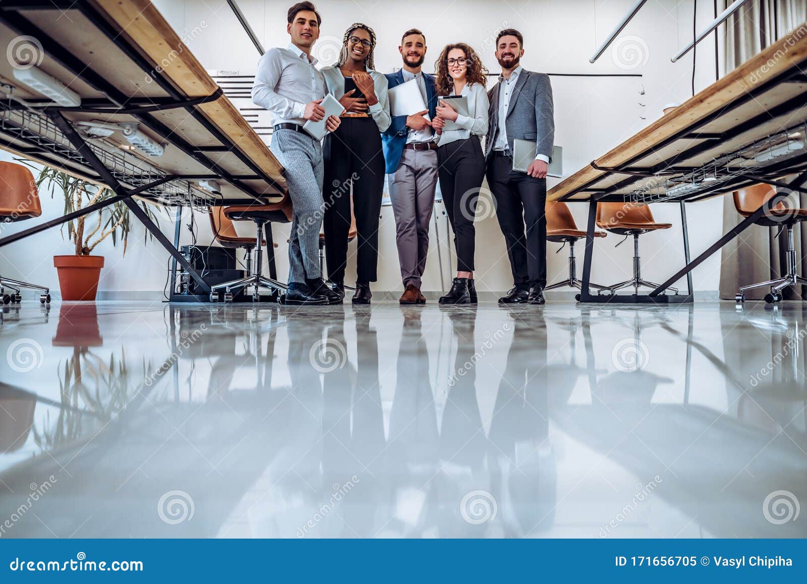Business it Team with Devices Looking Camera Stock Image - Image of ...