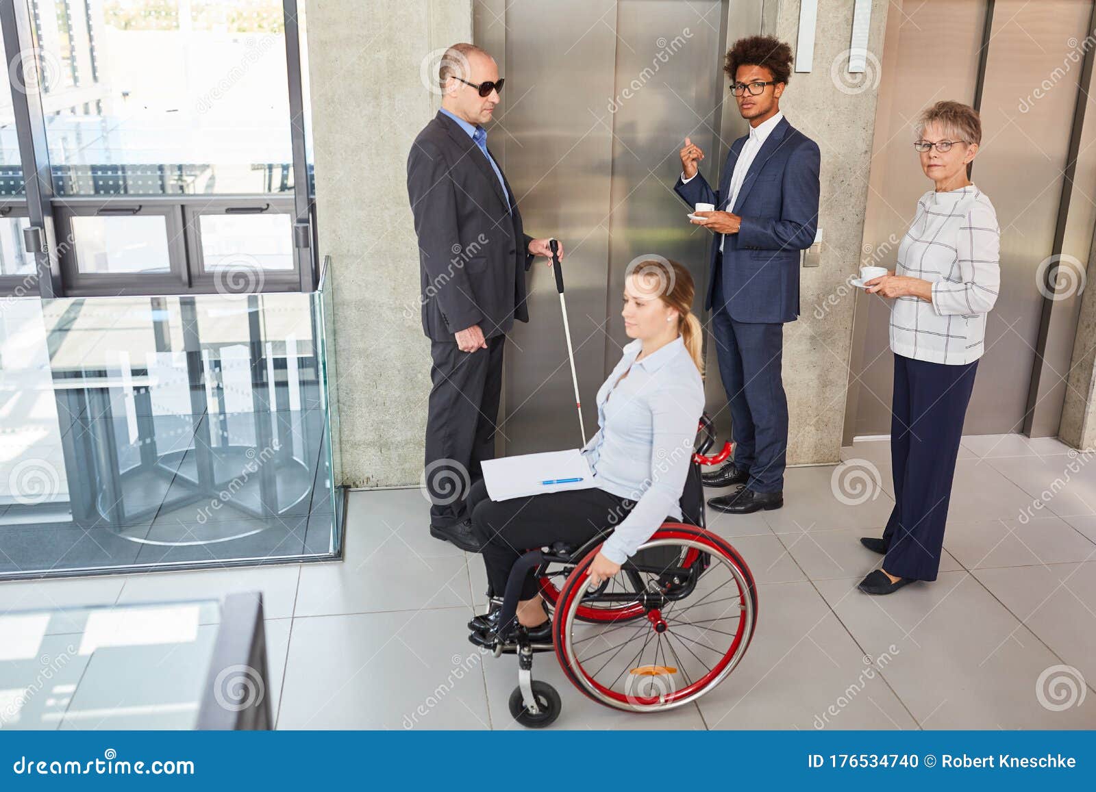 Business Team with Disabled Colleagues at the Elevator Stock Photo ...
