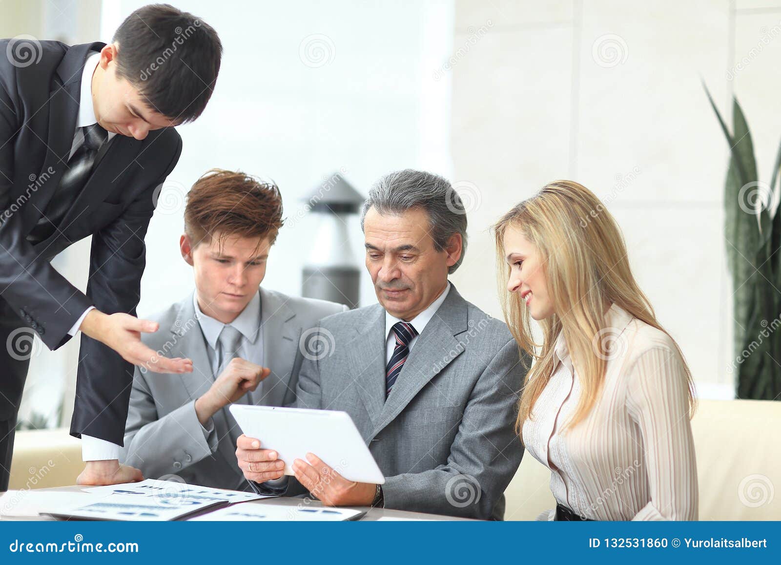Business Team Discusses New Ideas at the Office Table Stock Photo ...
